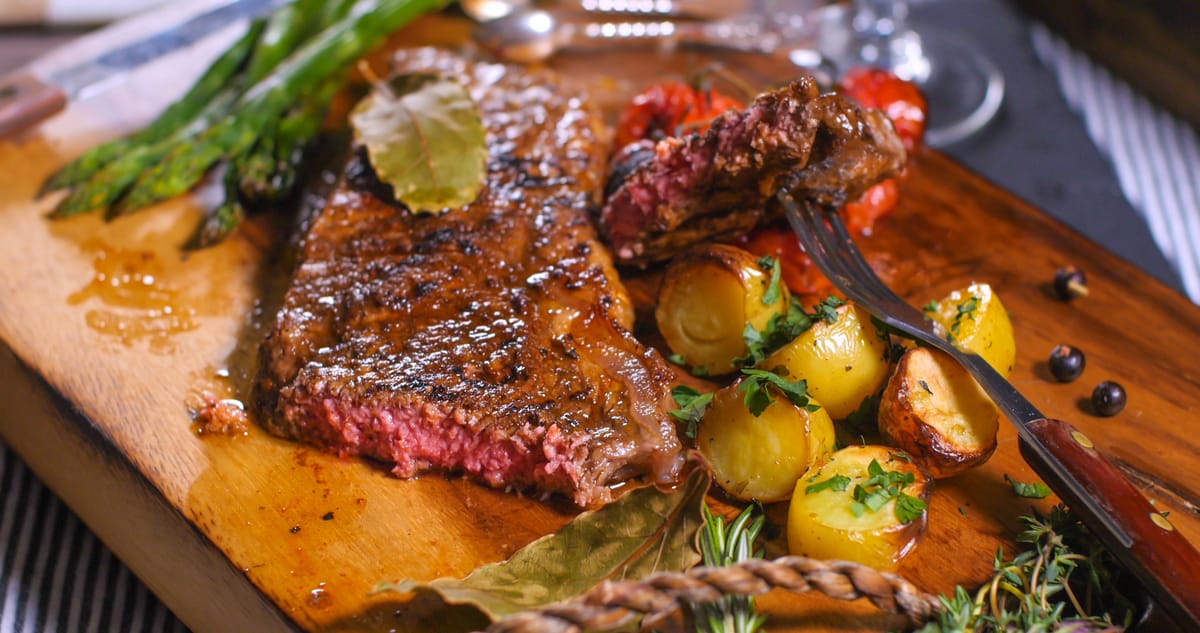 Beef Escalopes with Tomato, Olives and Potatoes